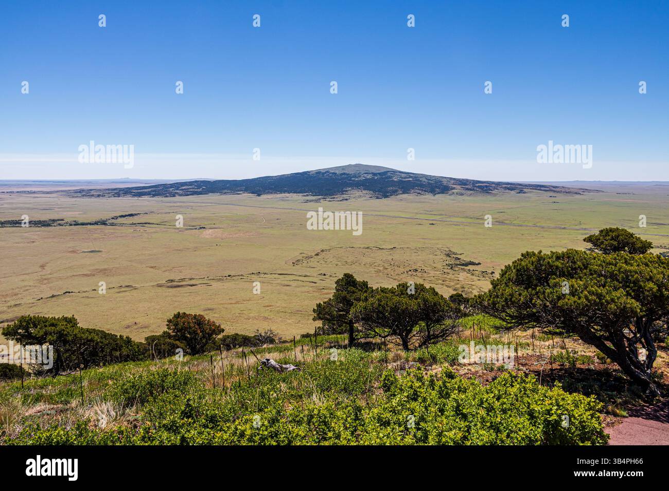 Serene landscape of the volcanic field seen from Crater Rim Trail at ...