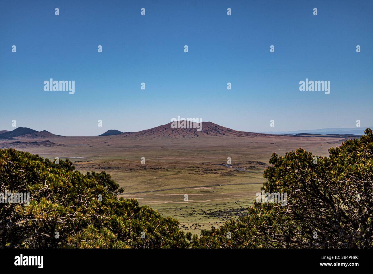 Serene landscape of the volcanic field seen from Crater Rim Trail at ...