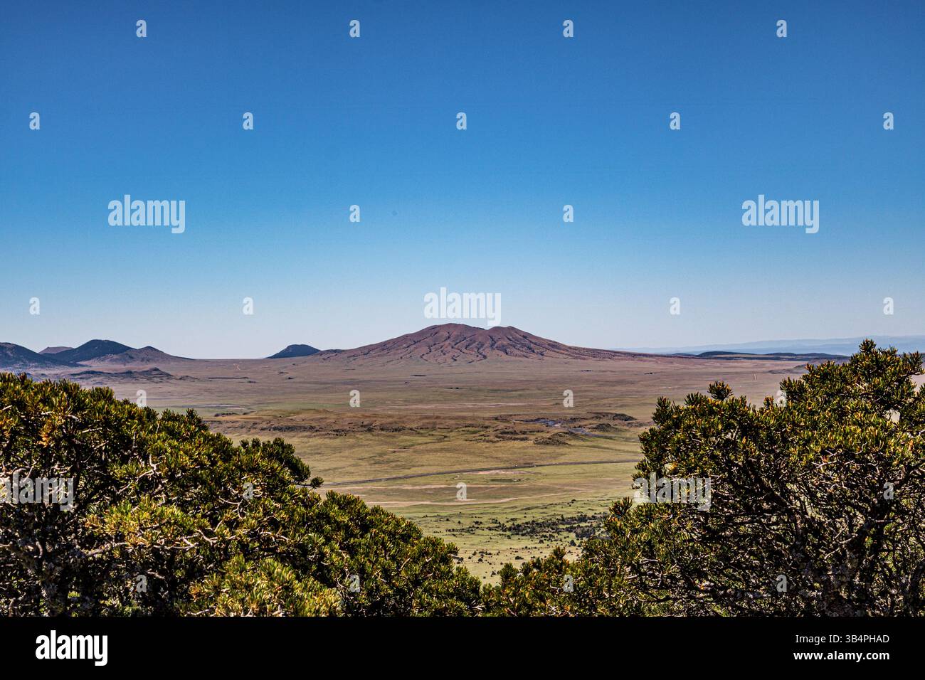 Serene landscape of the volcanic field seen from Crater Rim Trail at ...