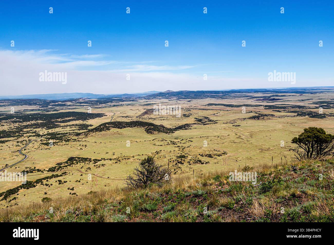 Serene landscape of the volcanic field seen from Crater Rim Trail at ...