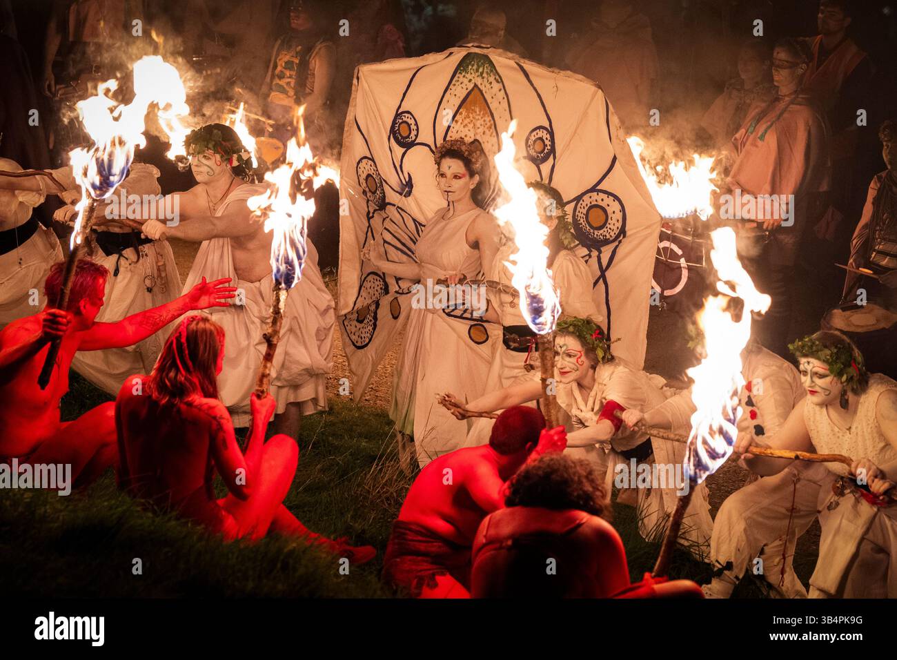 Performers take part in the Beltane Fire Festival in Edinburgh. A ...
