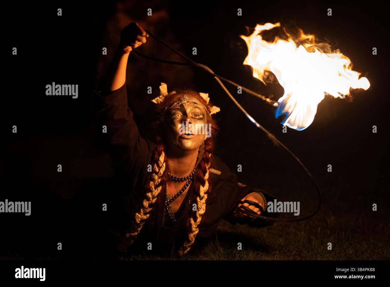 Performers take part in the Beltane Fire Festival in Edinburgh. A ...