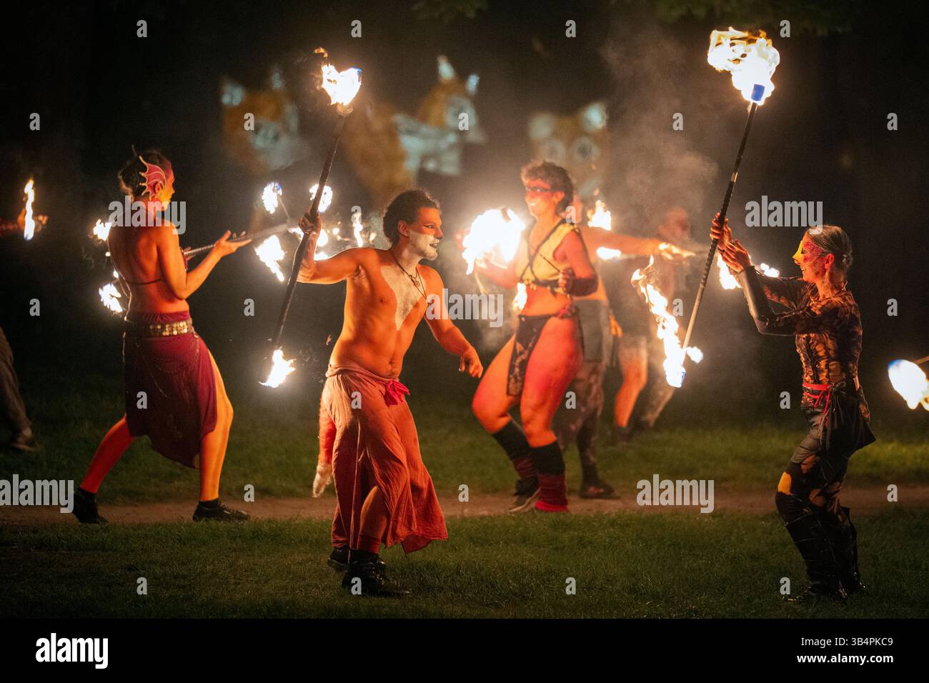 Performers take part in the Beltane Fire Festival in Edinburgh. A ...