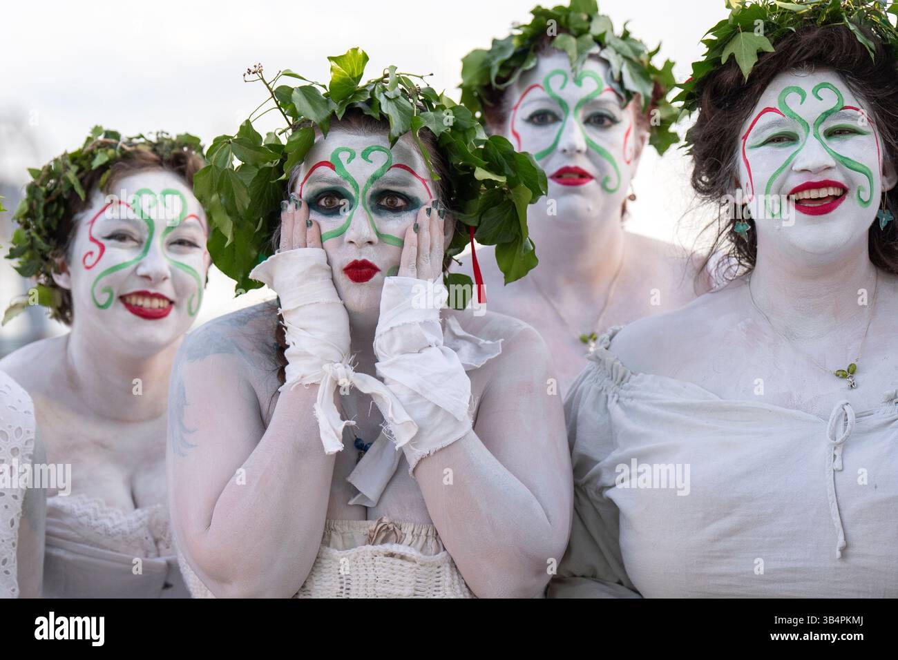 Performers take part in the Beltane Fire Festival in Edinburgh. A ...