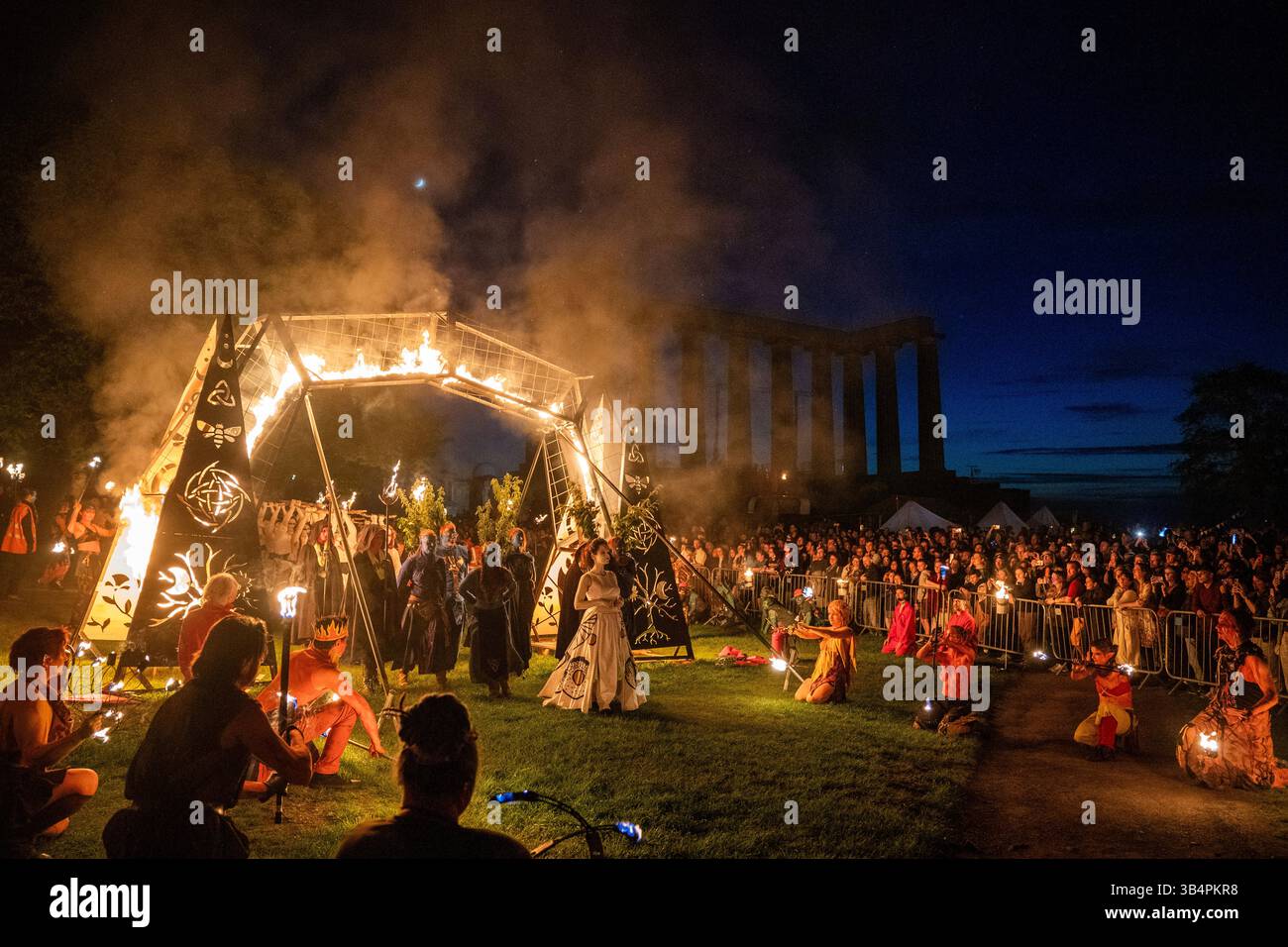 Performers take part in the Beltane Fire Festival in Edinburgh. A ...