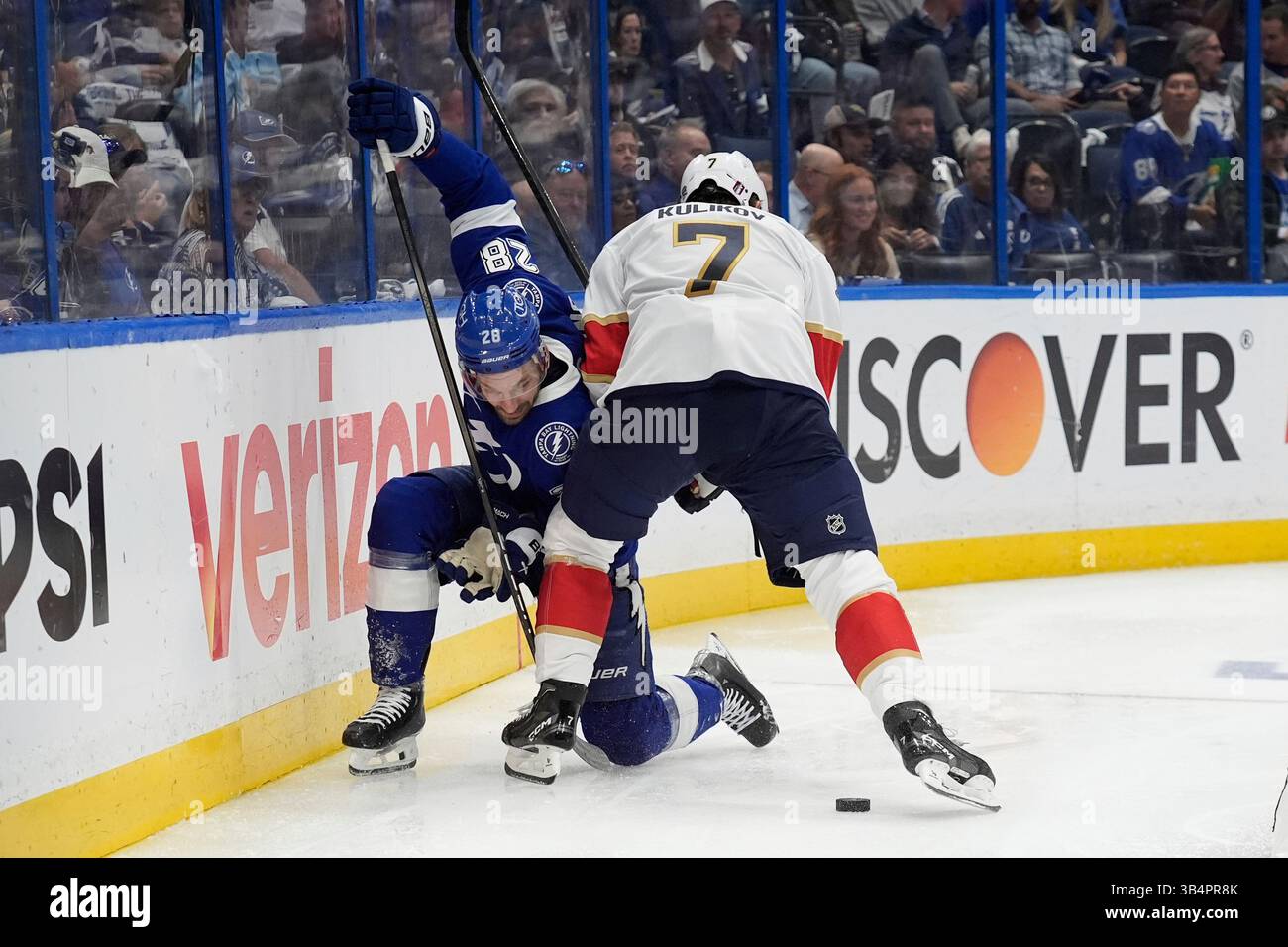 Florida Panthers defenseman Dmitry Kulikov (7) takes down Tampa Bay Lightning center Zemgus ...
