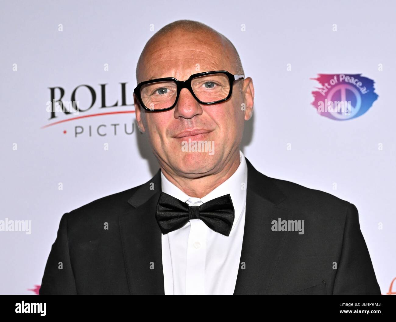 Tomi May attends the premiere of "Words of War" at Village East by ...