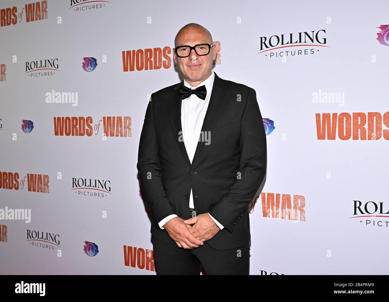 Tomi May attends the premiere of "Words of War" at Village East by ...