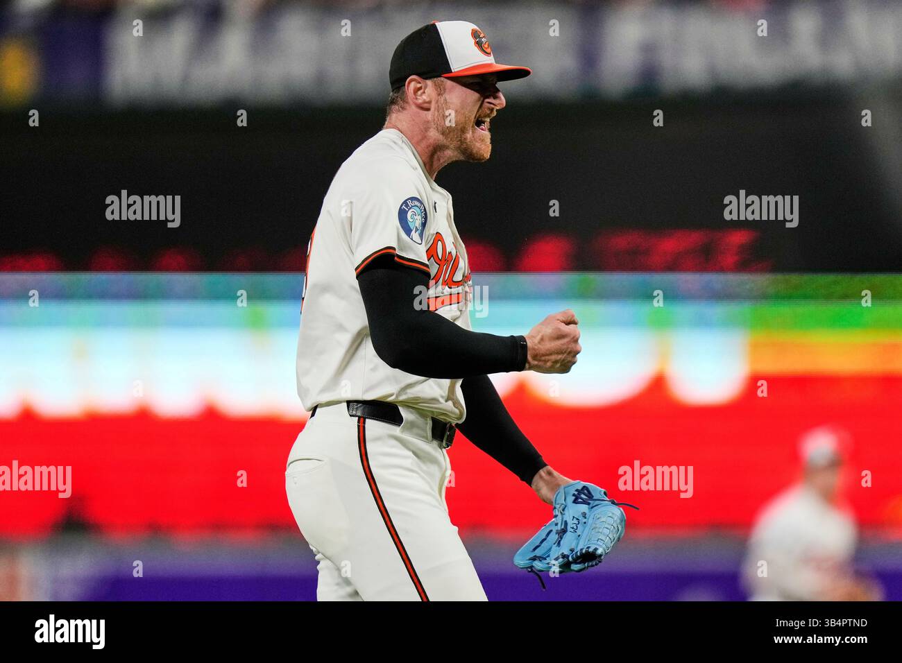 Baltimore Orioles relief pitcher Bryan Baker reacts after striking out ...