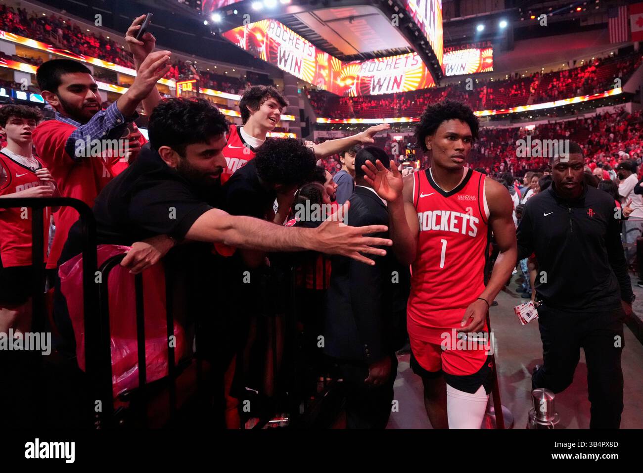 Houston Rockets forward Amen Thompson high fives fans after Game 5 of ...