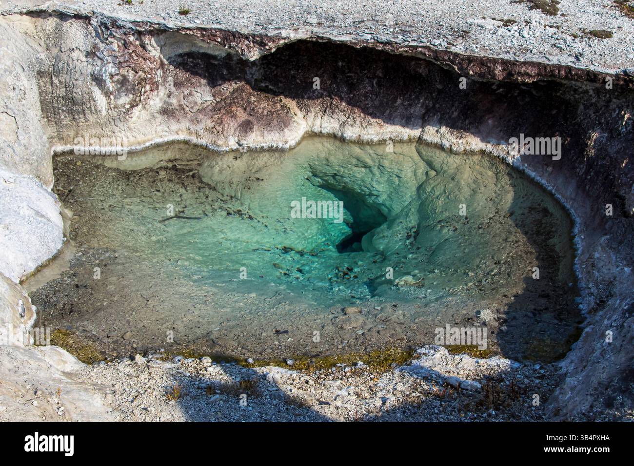 Visitors marvel at the stunning hot spring filled with crystal clear ...