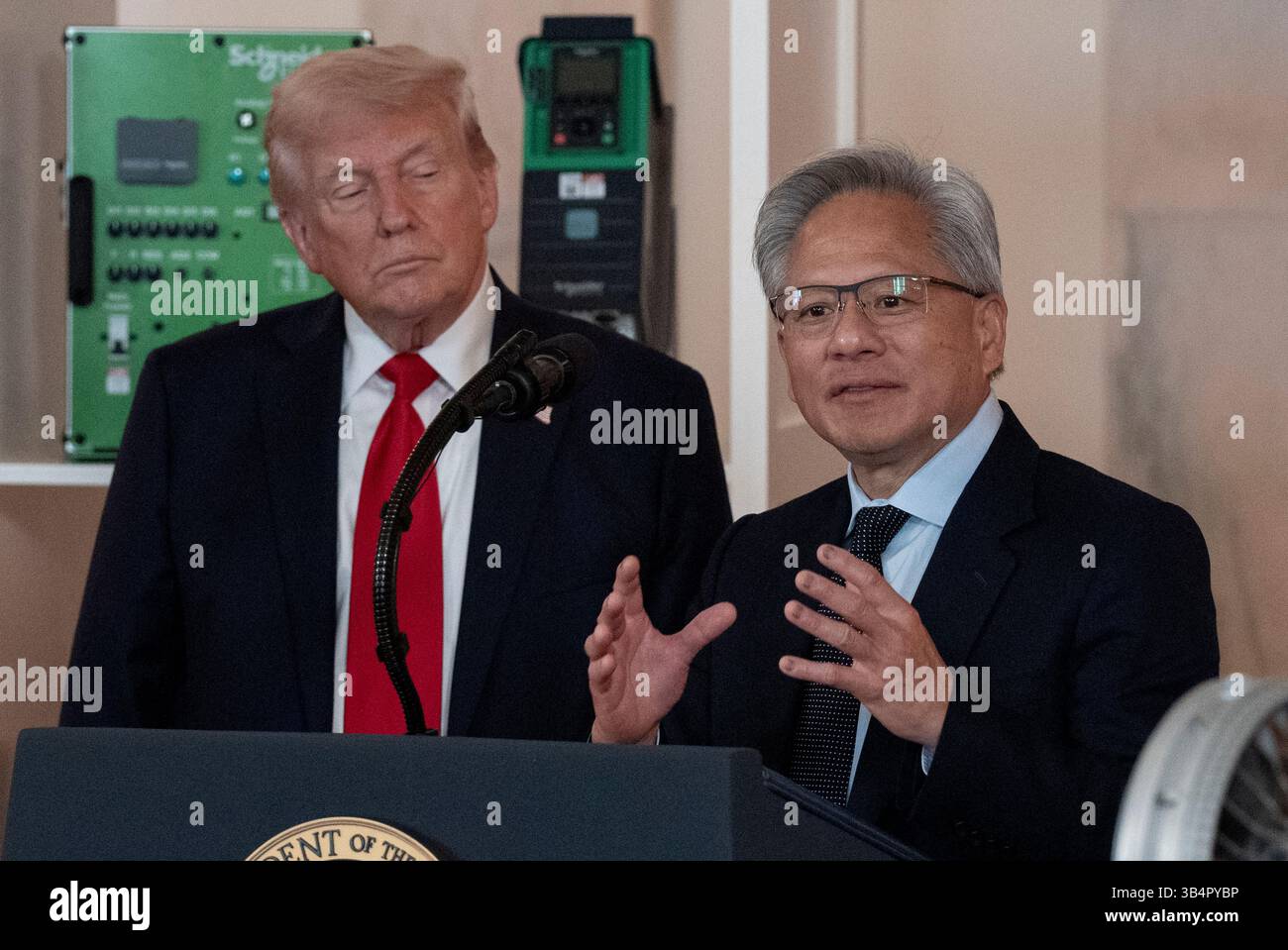 Nvidia CEO Jensen Huang speaks as United States President Donald J ...