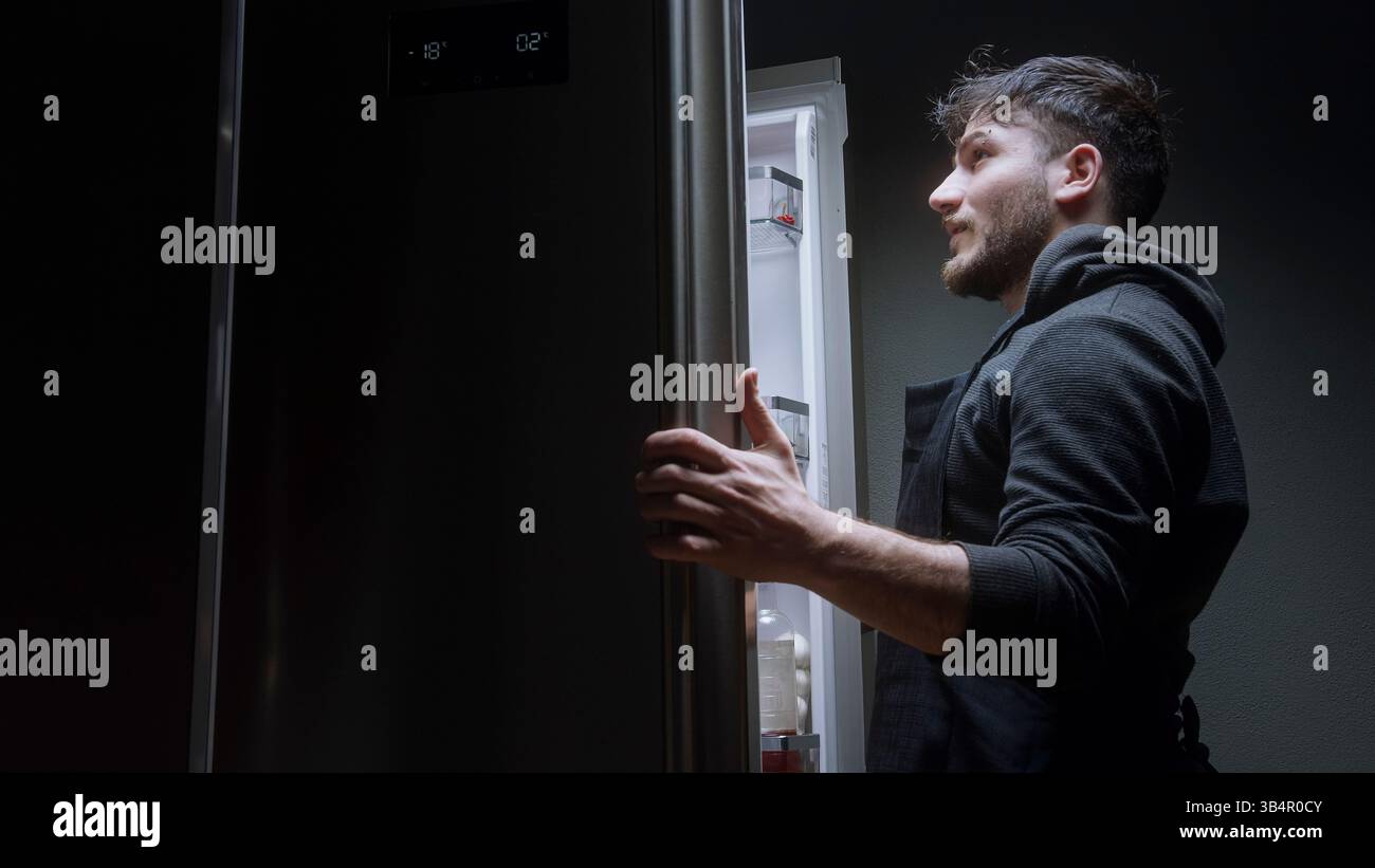 Frustrated Man Searching for Food in Refrigerator and Not Finding What ...