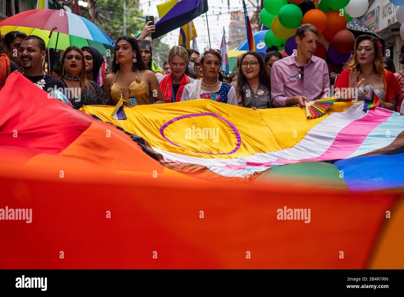 FILE—In this Aug. 20, 2024 file photo, members of the LGBTQ+ community ...