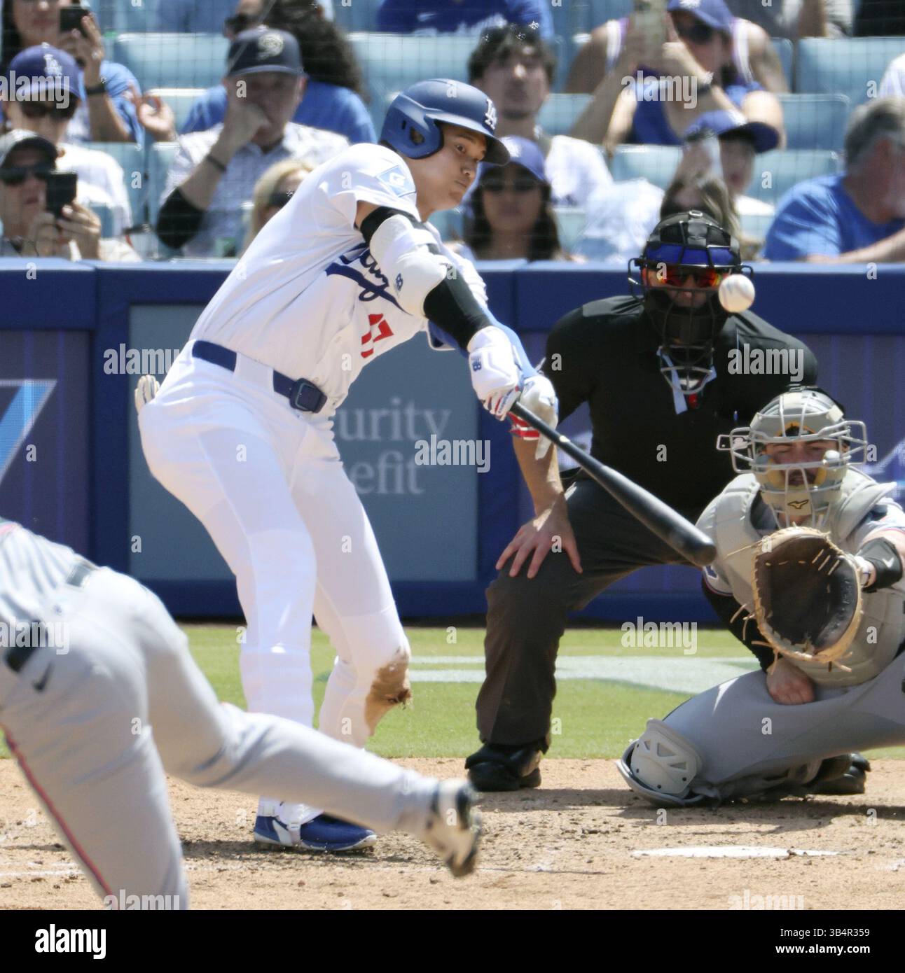 Los Angeles Dodgers designated hitter Shohei Ohtani hits a triple in ...