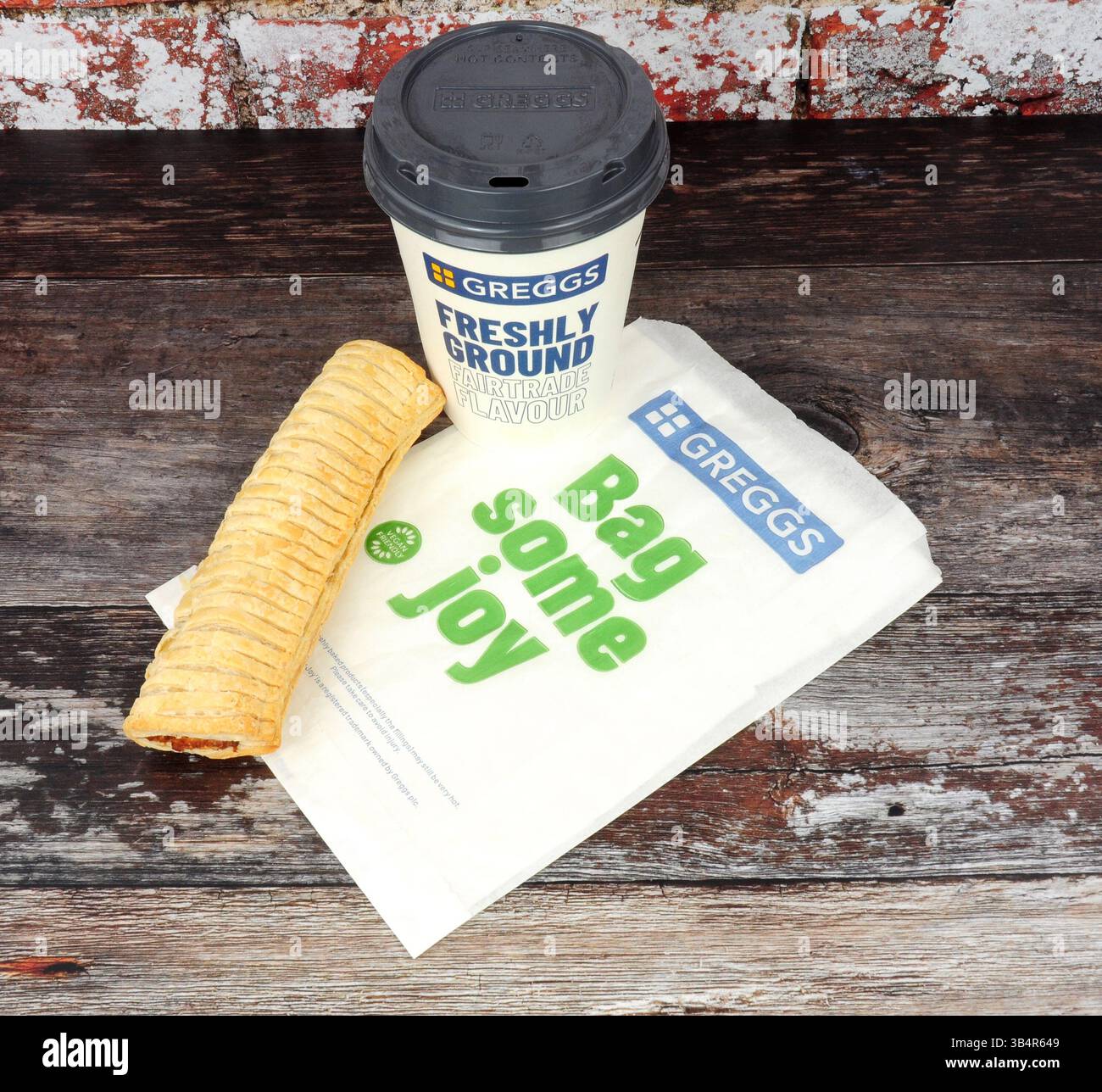 Greggs vegan puff pastry sausage roll with take away bag design and ...