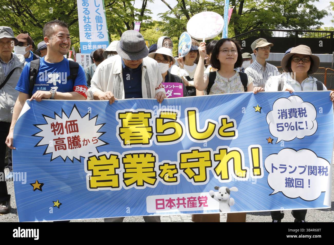 Peoeple march through the streets to mark May Day in Tokyo Thursday ...