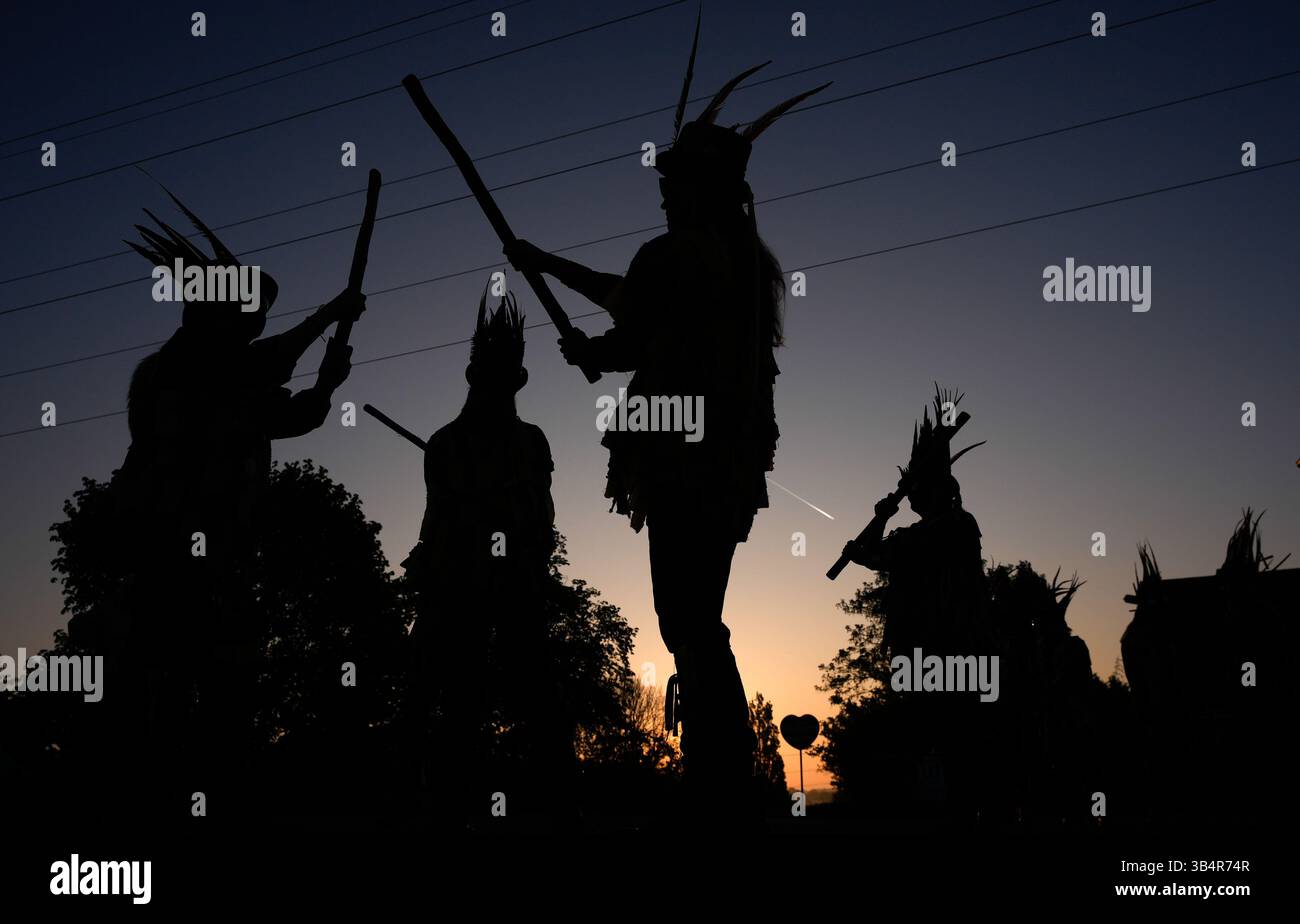 Members of the Hook Eagle Morris perform outside the Shack Cafe near to ...