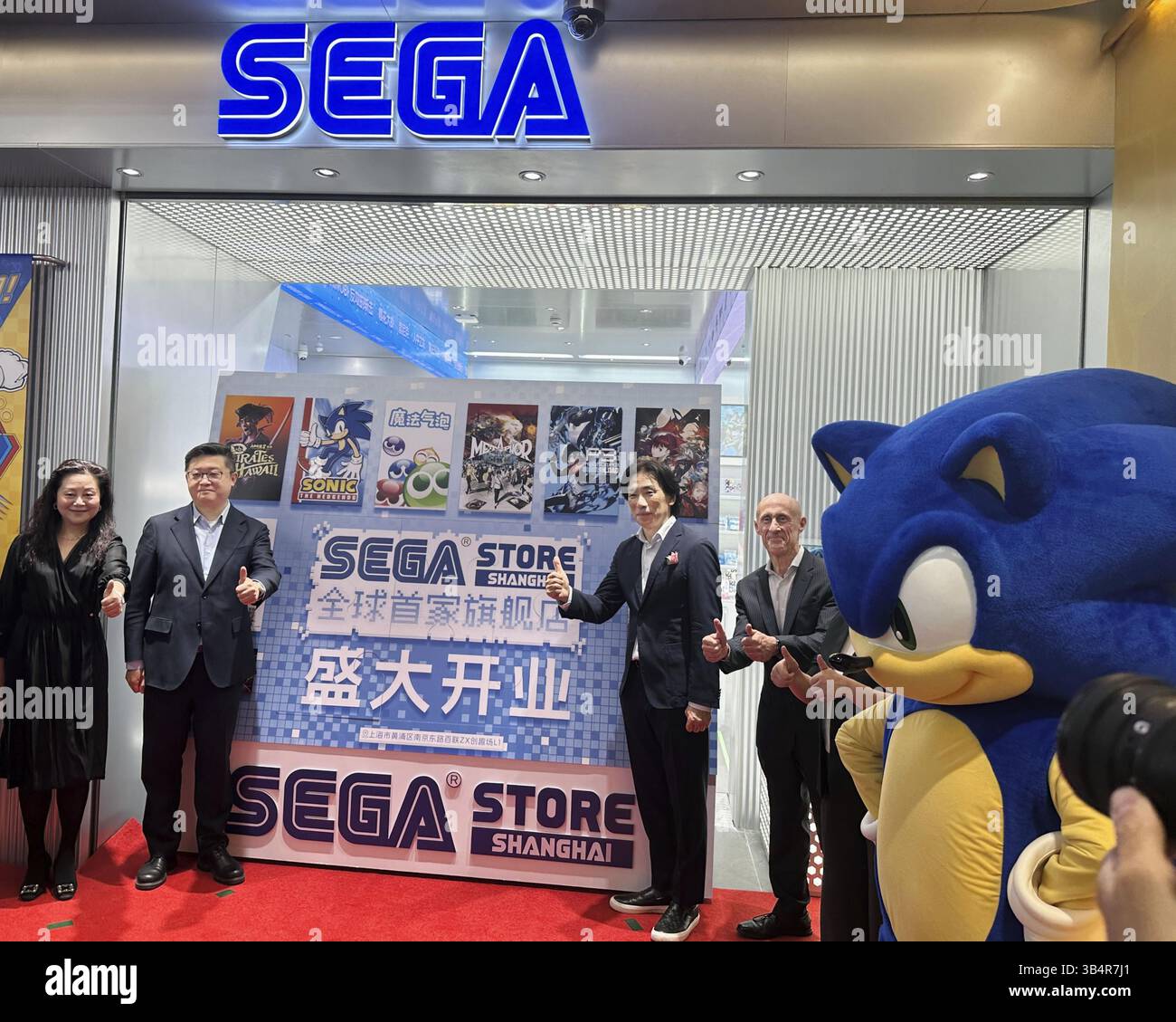 Sega Corp. President Shuji Utsumi (3rd from L) poses for a photo during ...