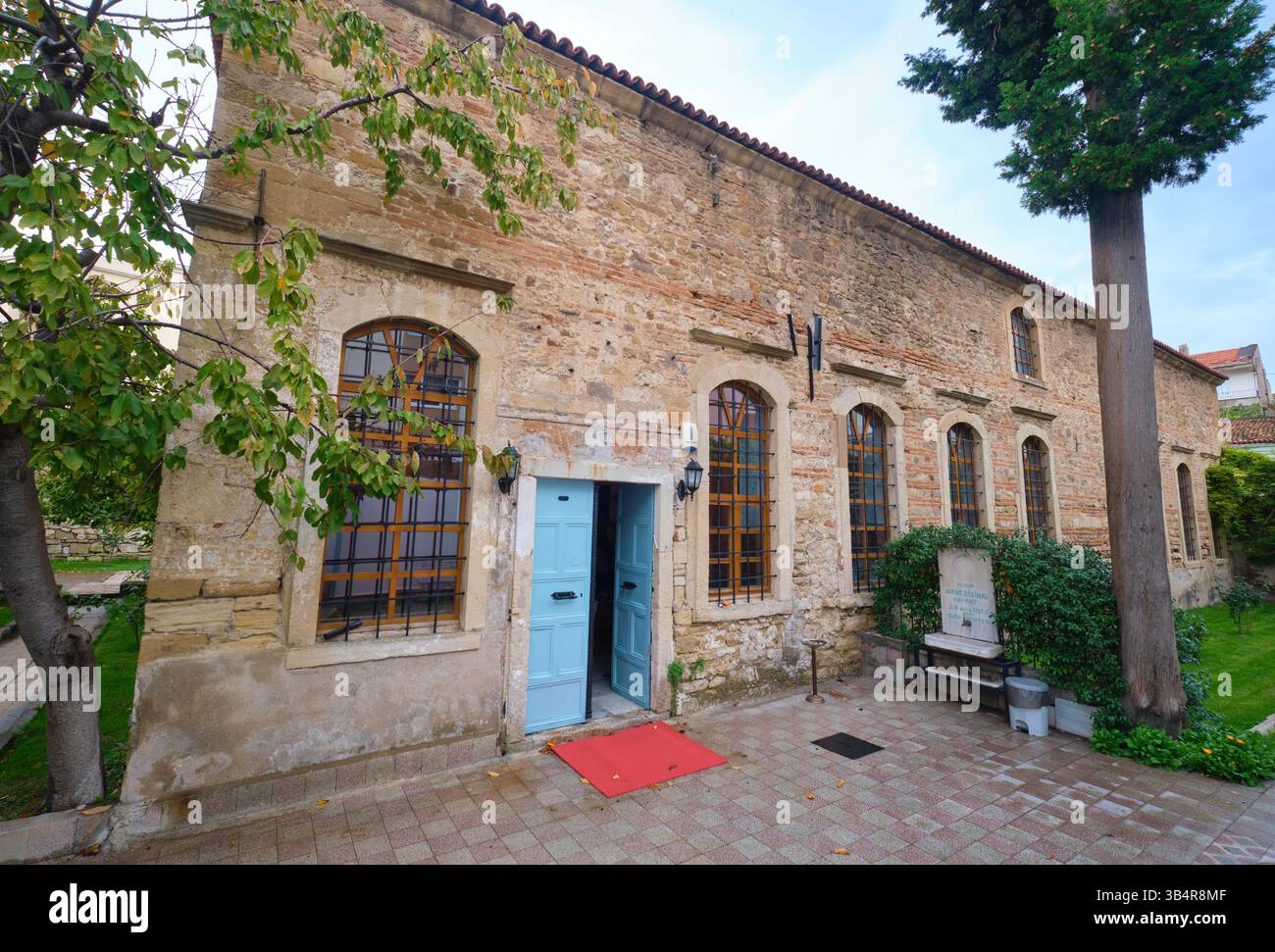 The inviting blue door of the main entrance to the Jewish temple. At ...