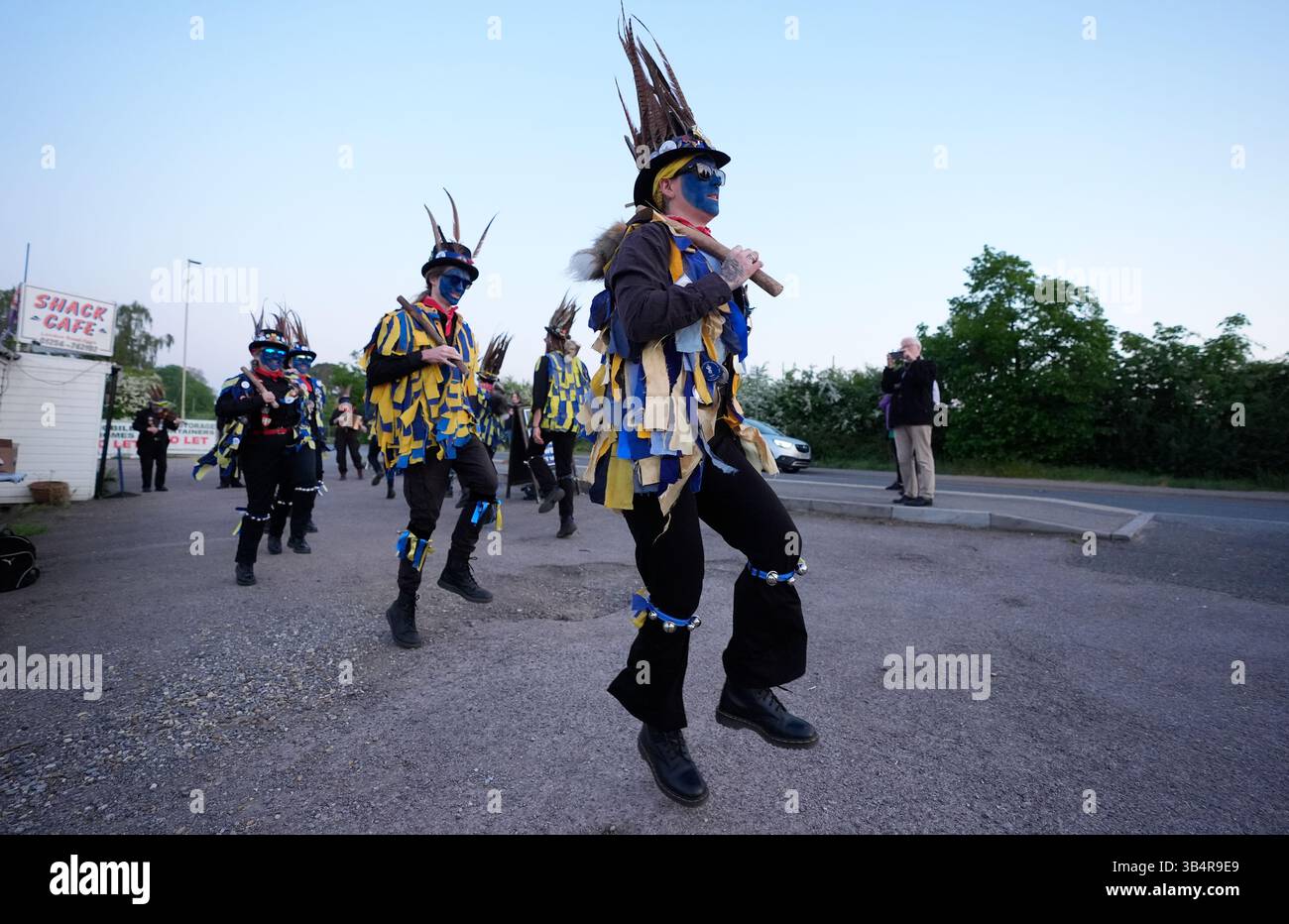 Members of the Hook Eagle Morris perform outside the Shack Cafe near to ...
