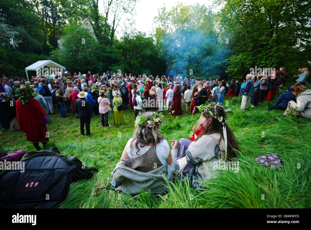 People during the Beltane celebrations at Glastonbury Chalice Well ...