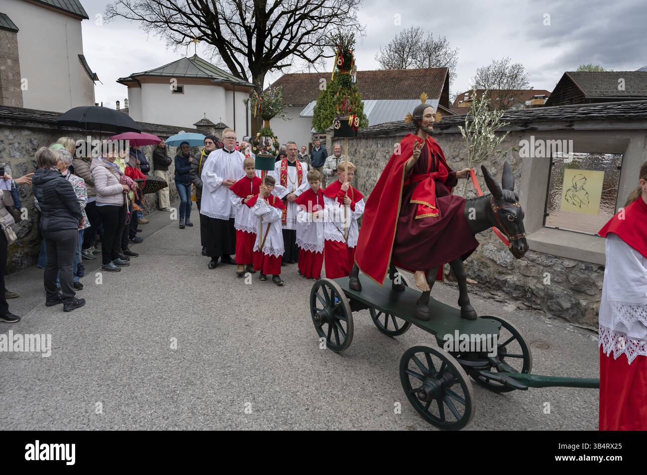 Altar servers accompany the palm procession, tradition since the 18th ...
