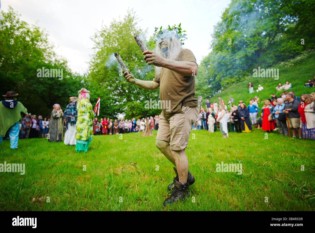 People during the Beltane celebrations at Glastonbury Chalice Well ...