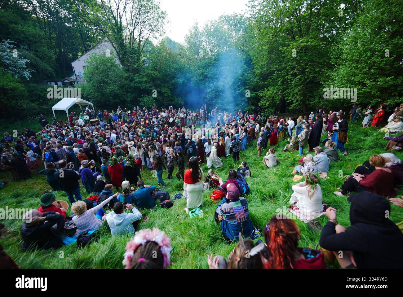 People during the Beltane celebrations at Glastonbury Chalice Well ...