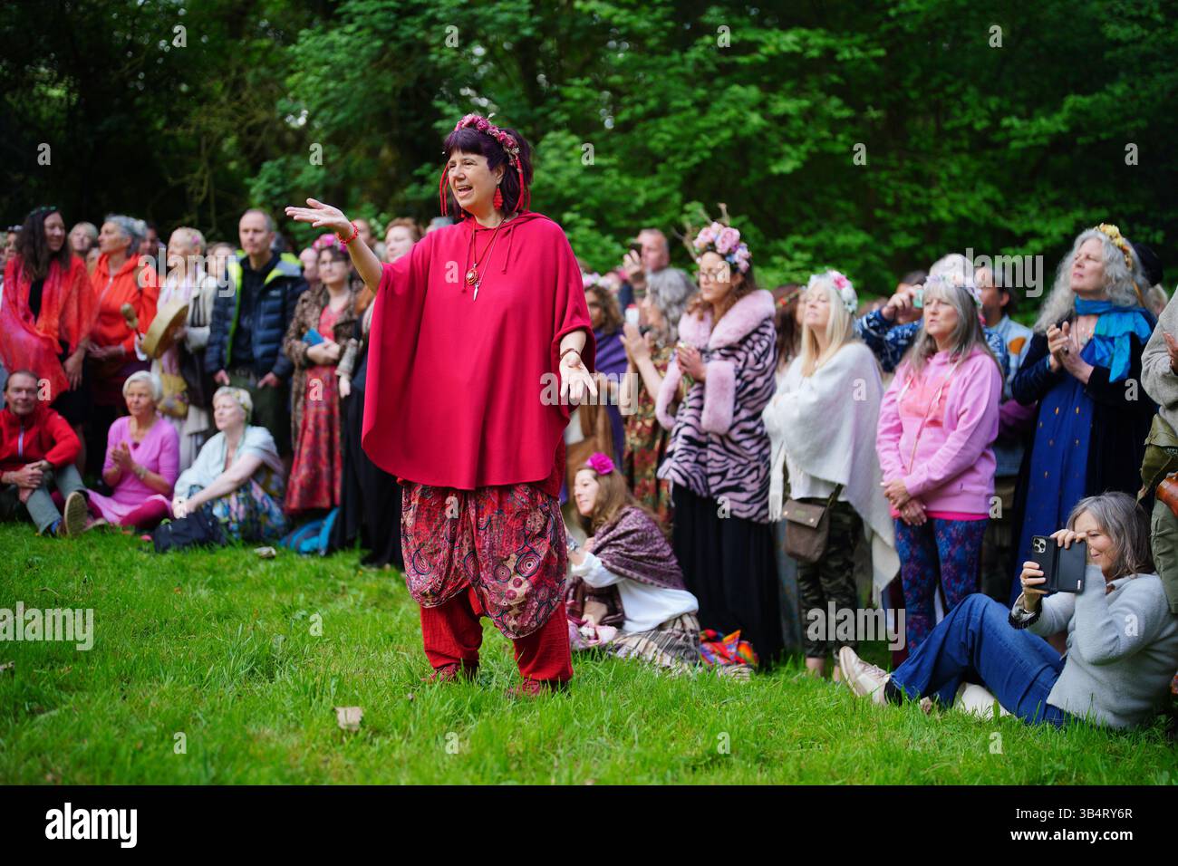 People during the Beltane celebrations at Glastonbury Chalice Well ...