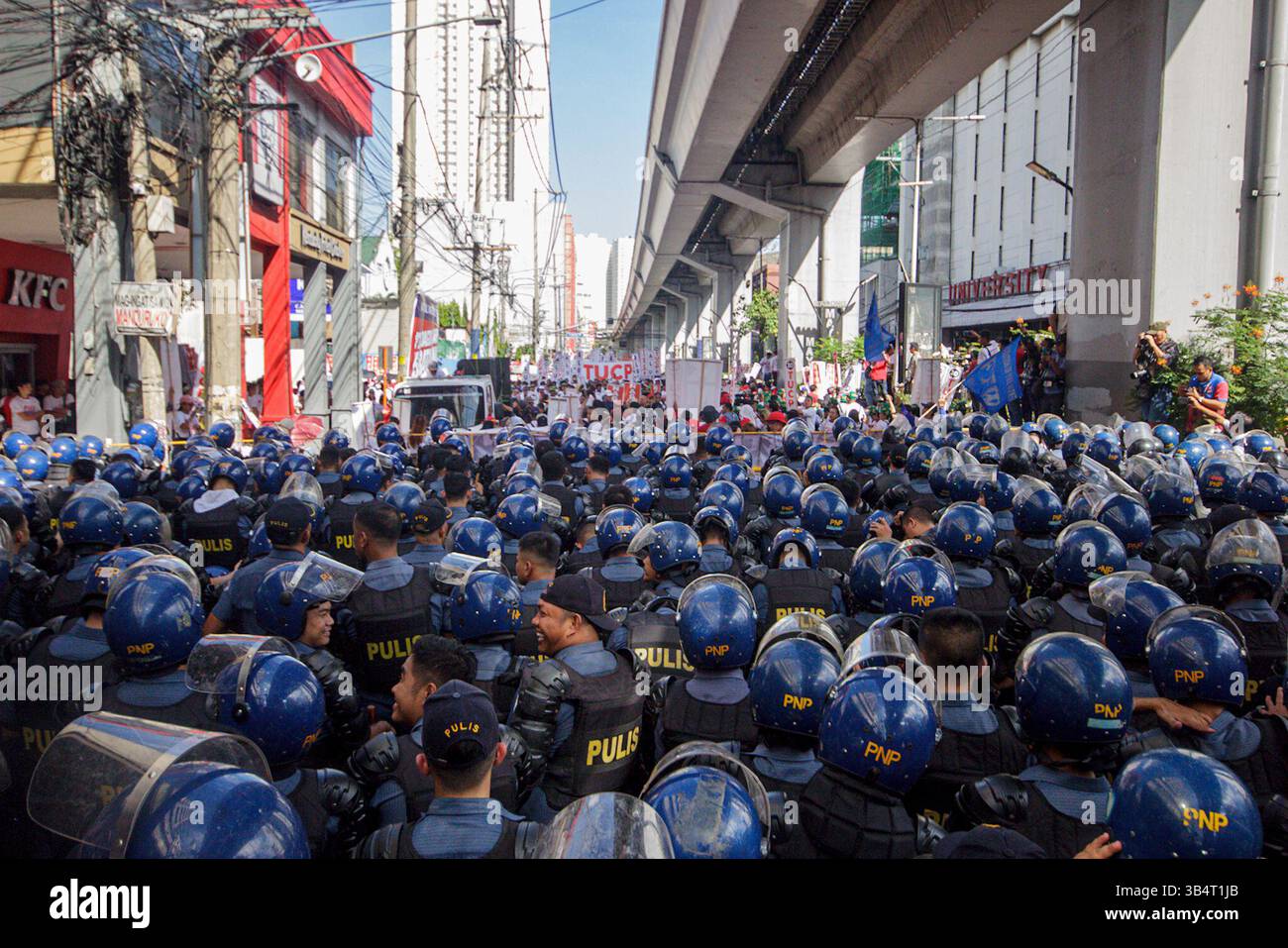 Manila, Ncr, Philippines. 1st May, 2025. Local police fills the road as ...
