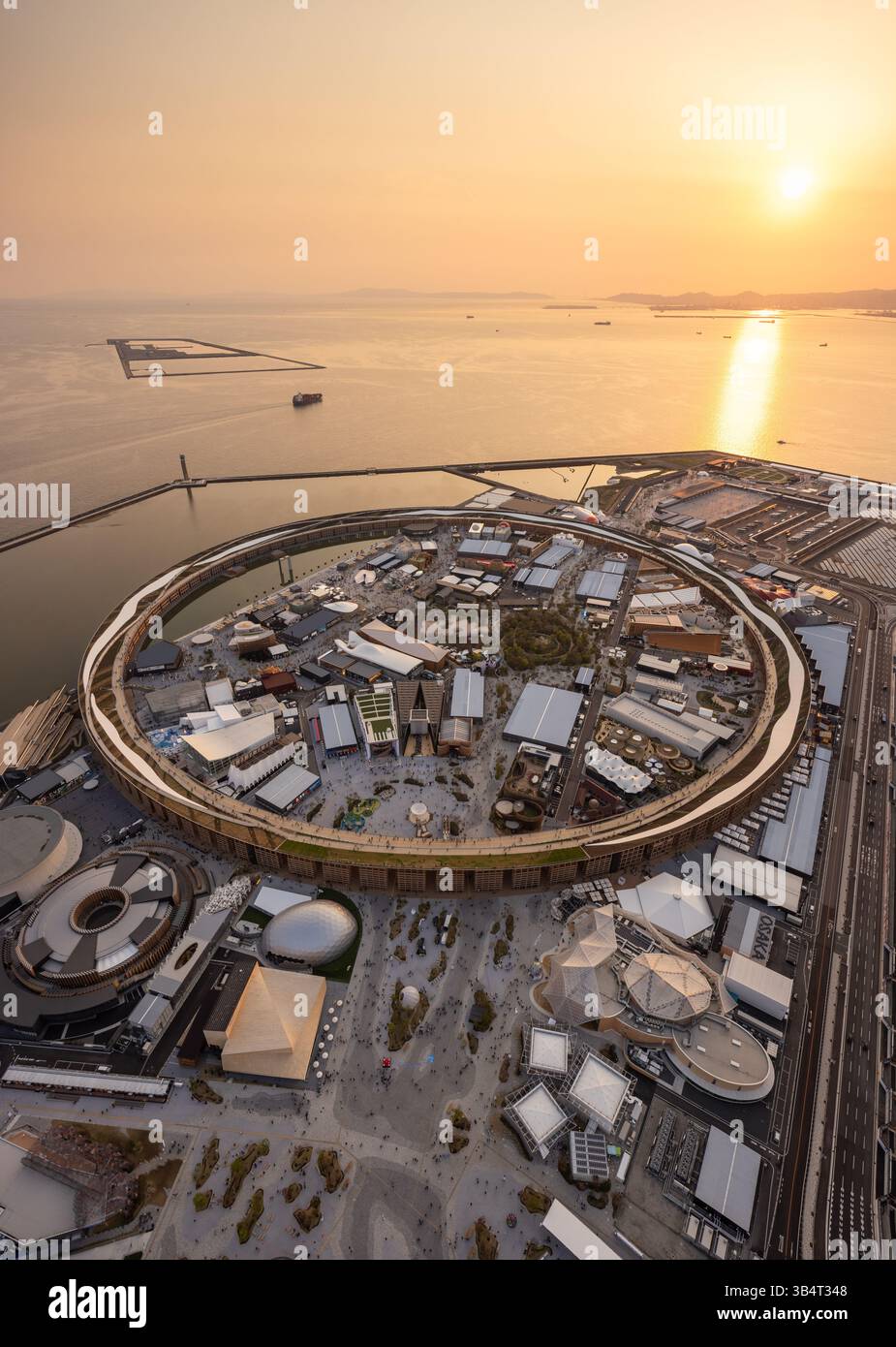 Aerial view of Osaka Expo 2025 Japan, helicopter view sunset of Grand ...
