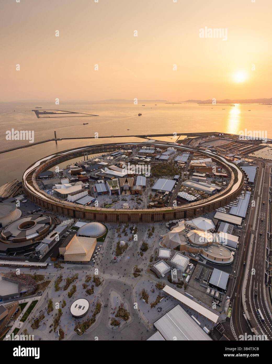 Aerial view of Osaka Expo 2025 Japan, helicopter view sunset of Grand ...