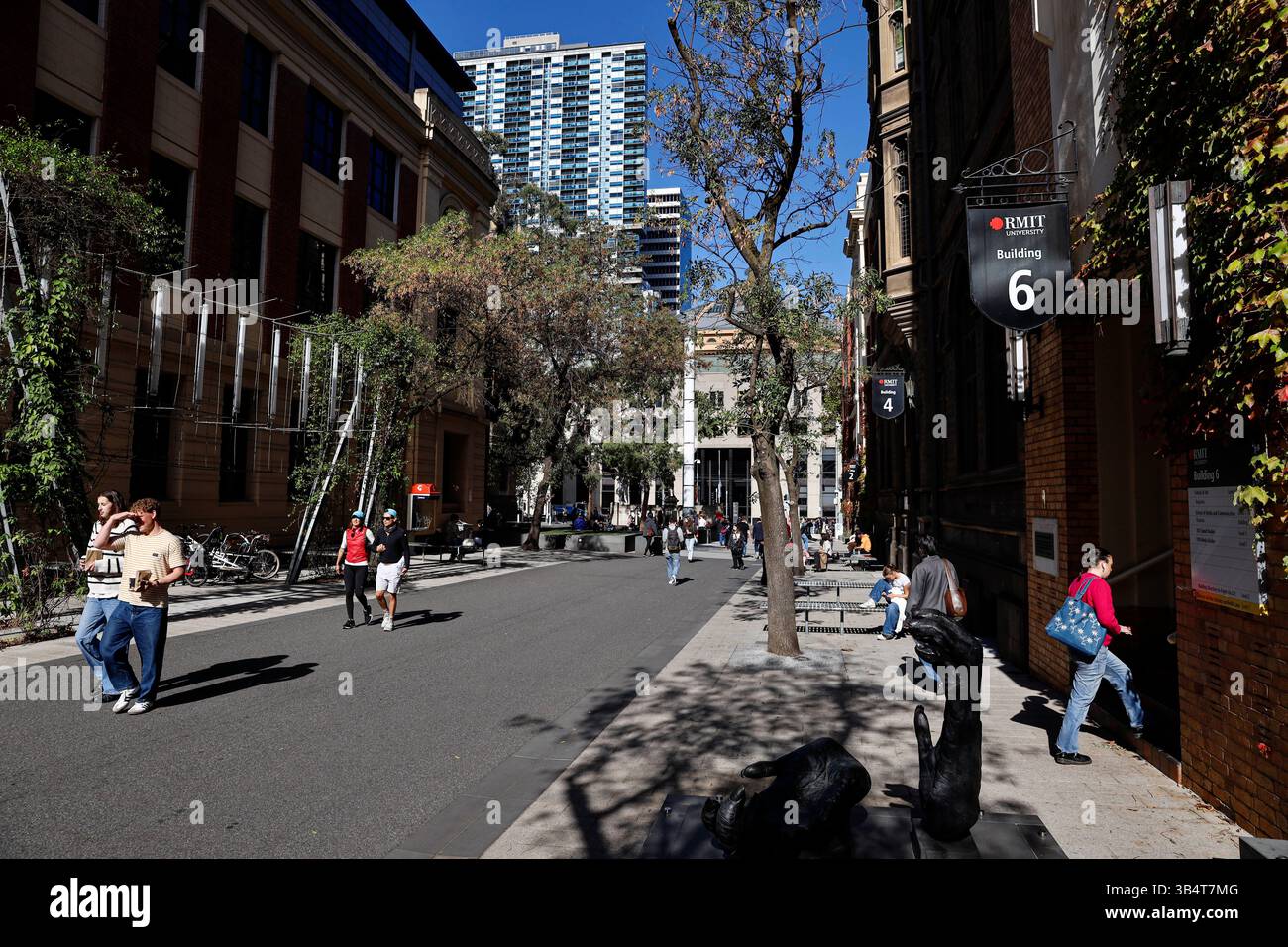 Students gather near the RMIT University campus. The federal election ...