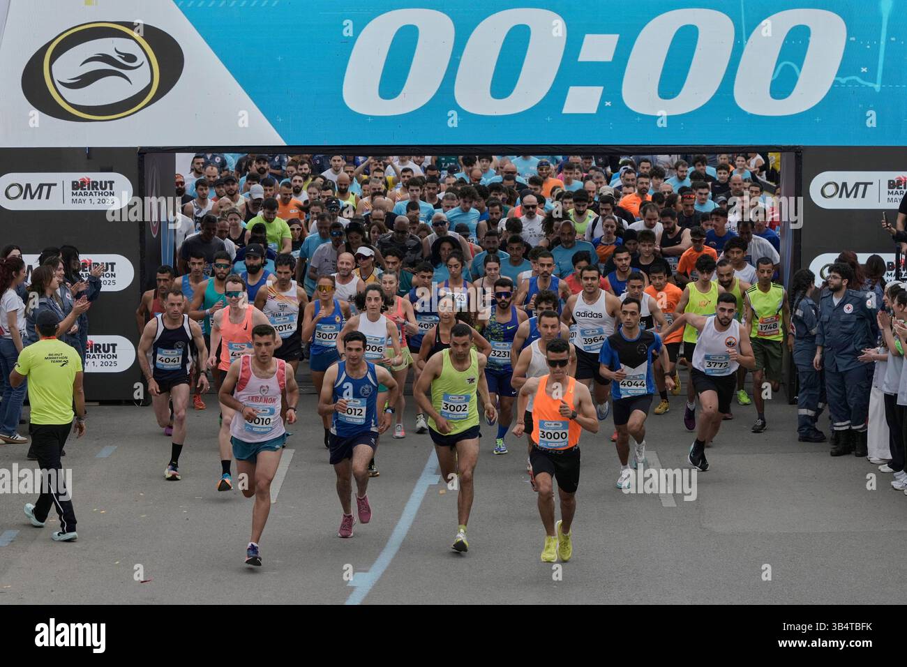 Runners compete in the 10 kilometers (6.2 miles) Beirut International ...