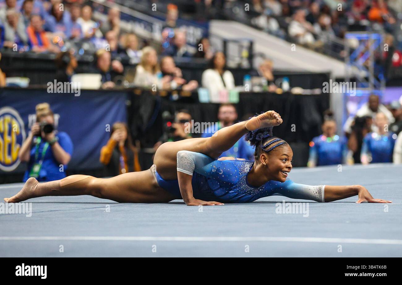 March 19, 2022: Florida's Trinity Thomas demonstrates her flexibility ...