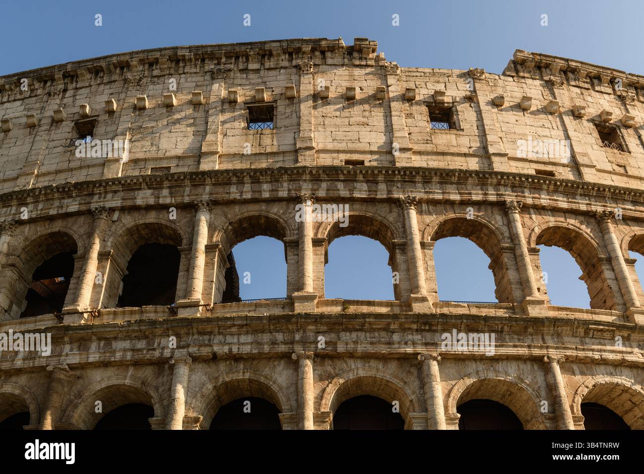 The Roman Colosseum ancient amphitheatre ruin in the center of Rome ...