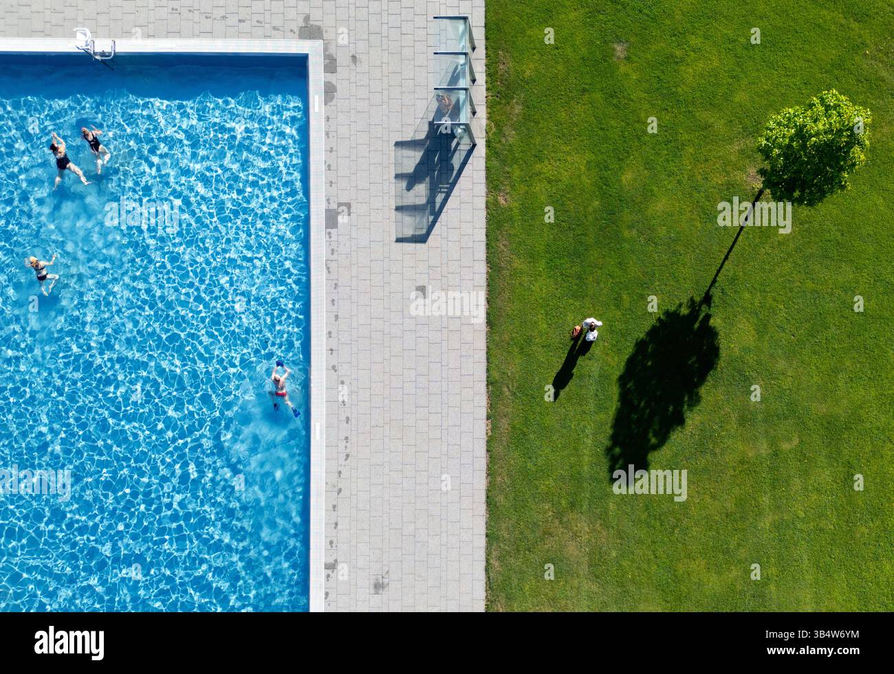 Munich, Germany. 01st May, 2025. Swimmers enjoy the beautiful weather ...