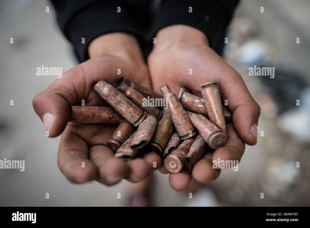 Ashrafiyat Sahnaya, Syria. 01st May, 2025. A person holds spent ...