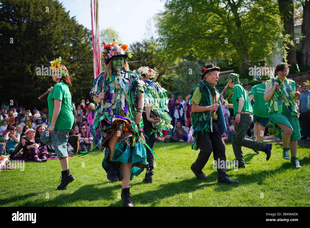 People dancing during the Beltane celebrations at Glastonbury Chalice ...