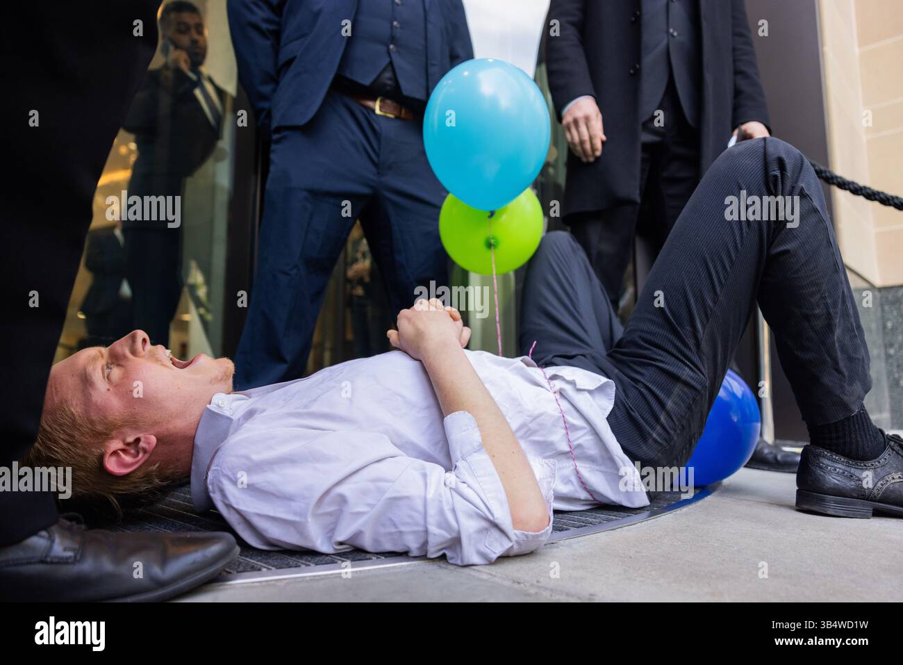 London, UK. 01 MAY, 2025. Protestor plays dead on floor as AXE DRAX ...