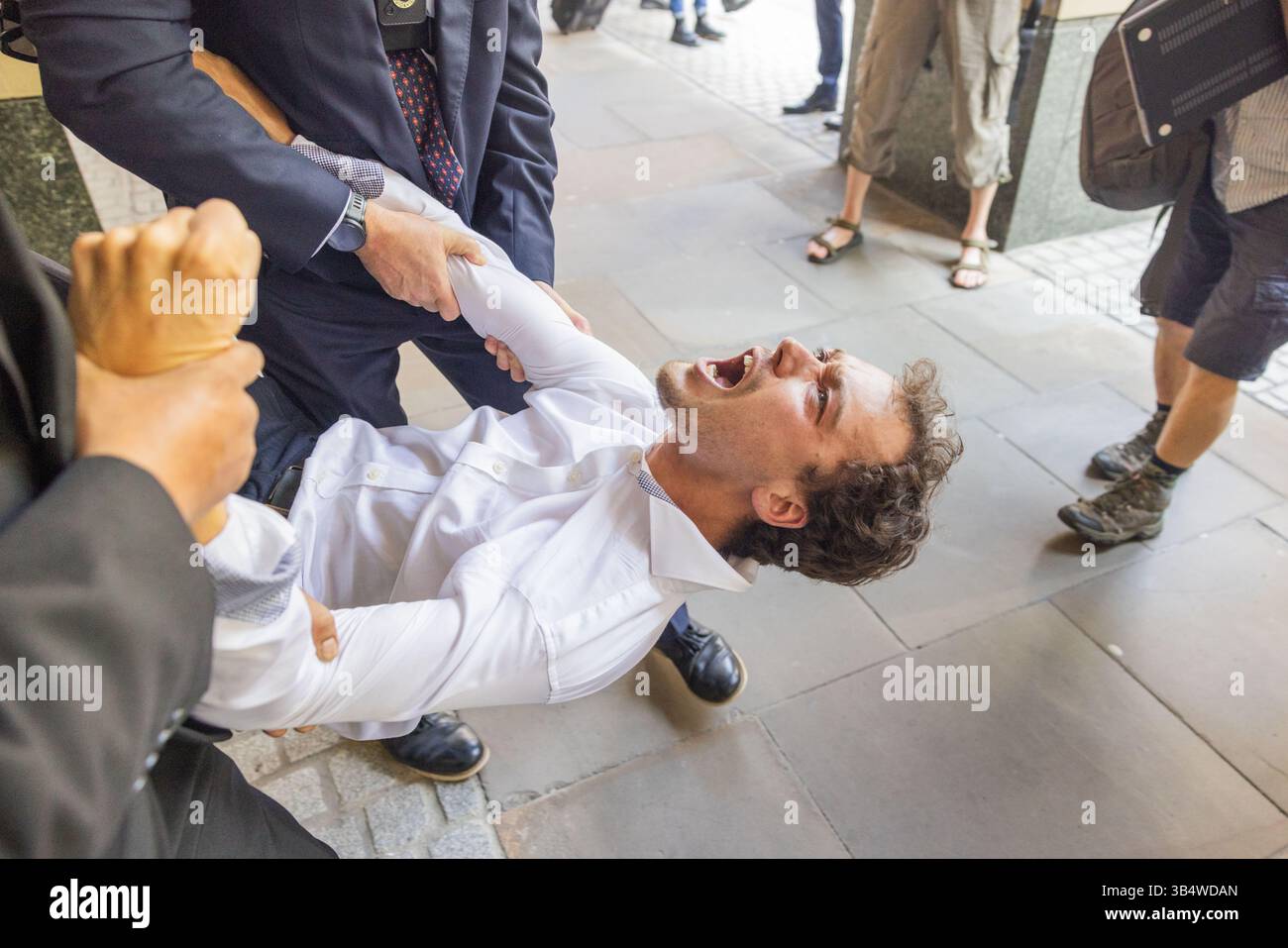 London, UK. 01 MAY, 2025. Protestor is removed as AXE DRAX activists ...