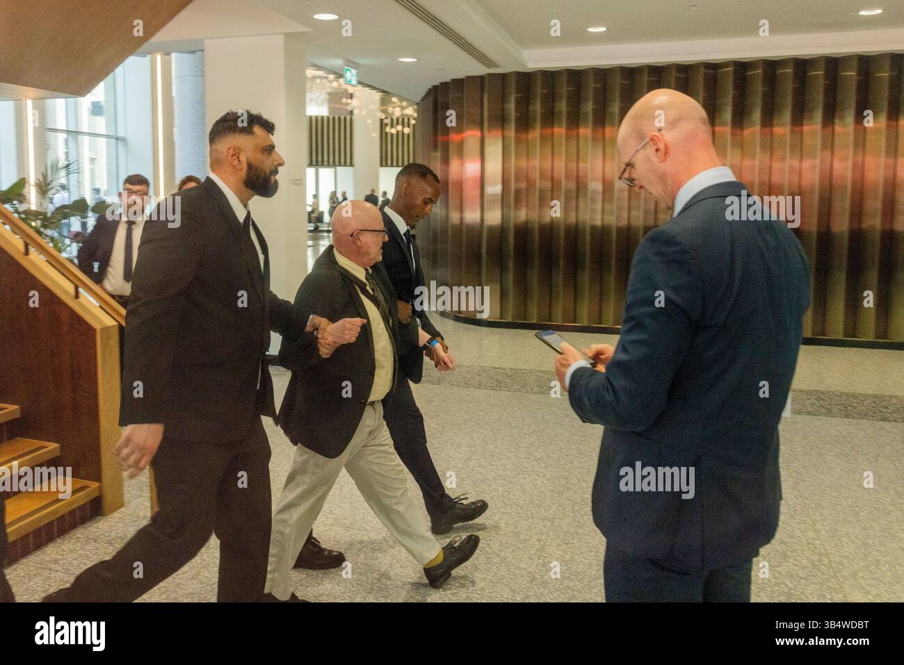 London, UK. 01 MAY, 2025. Protestor is removed as AXE DRAX activists ...