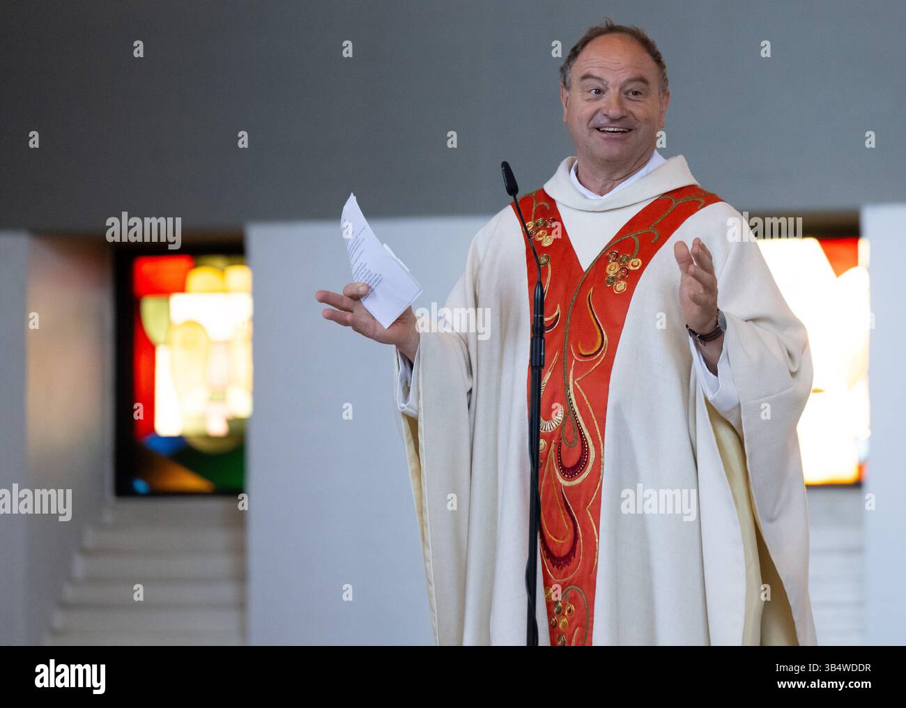 Munich, Germany. 01st May, 2025. Pastor Rainer Maria Schießler holds a ...