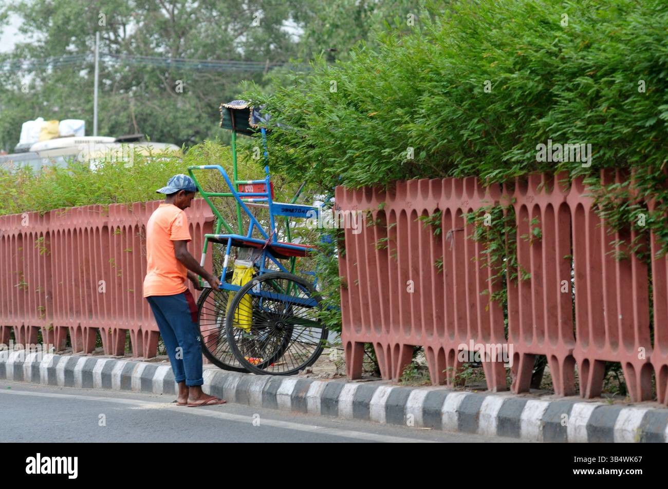June 14, 2022, New Delhi, India: During the heat of summer, A cycle ...