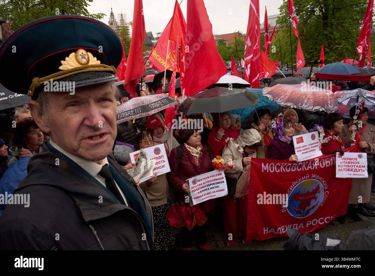 Russian Communist Party's supporters with poster reading "mothers of ...