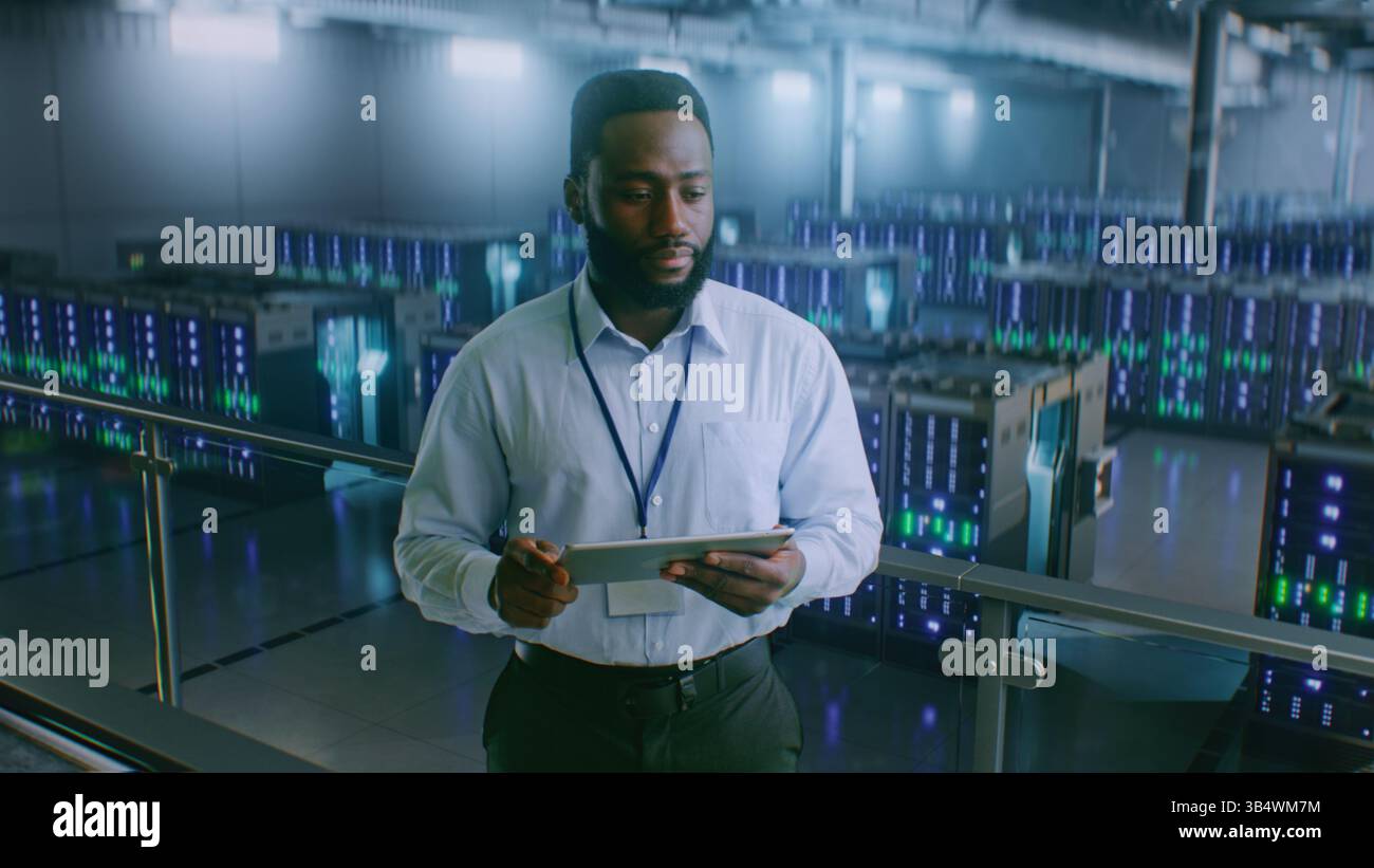 Big Data Center with Server Racks: Professional African American ...