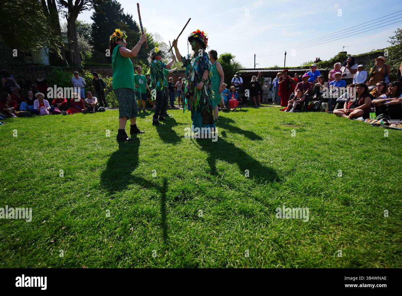 People during the Beltane celebrations at Glastonbury Chalice Well ...