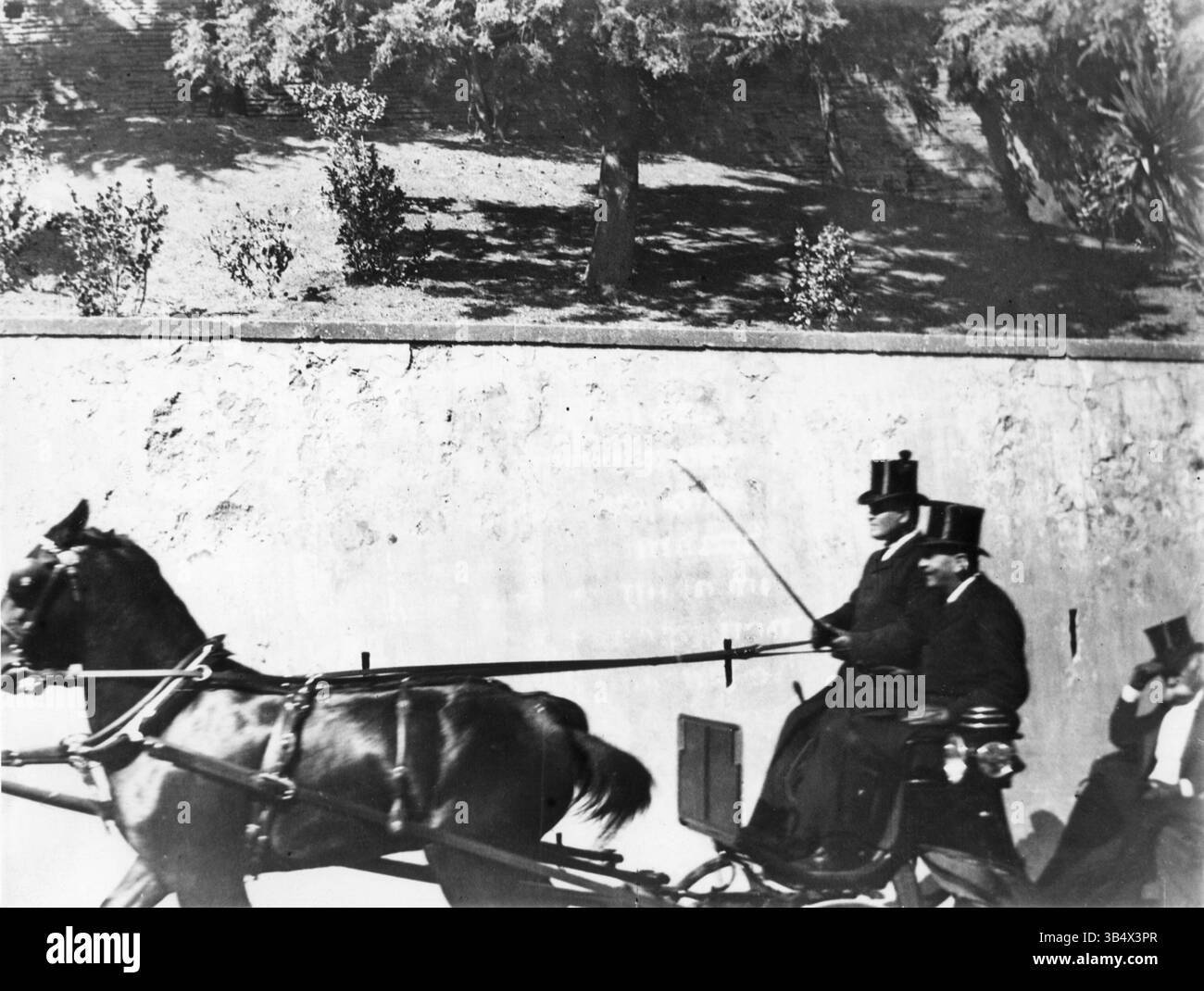 This rare 1890 photograph shows King Umberto I of Italy in a carriage ...