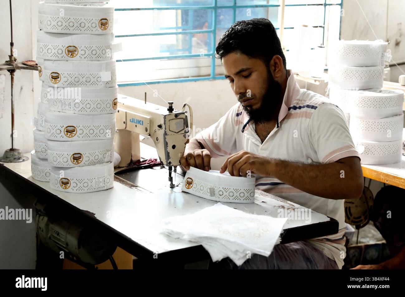 April 24, 2022, Dhaka, Bangladesh: Workers are busy making hats in the factory ahead of Eid-ul ...